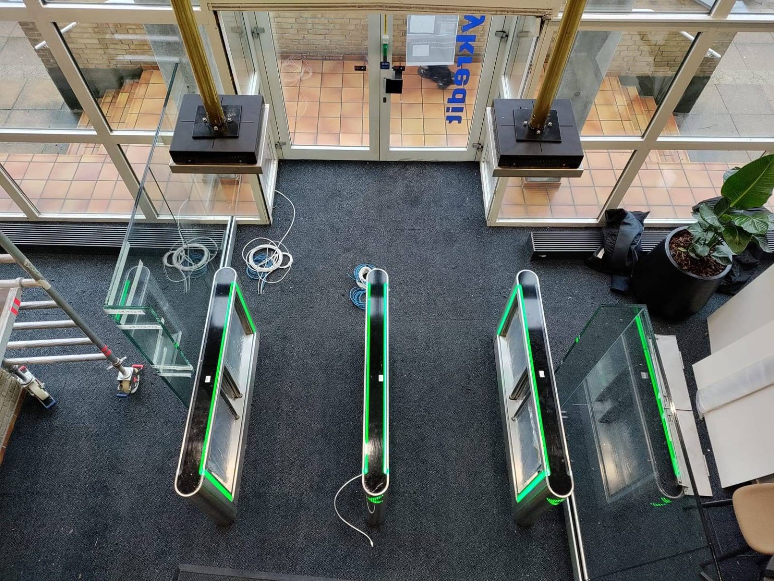 dFlow Free Flow Passage Turnstile Swing Gates - TURNSTILES.us