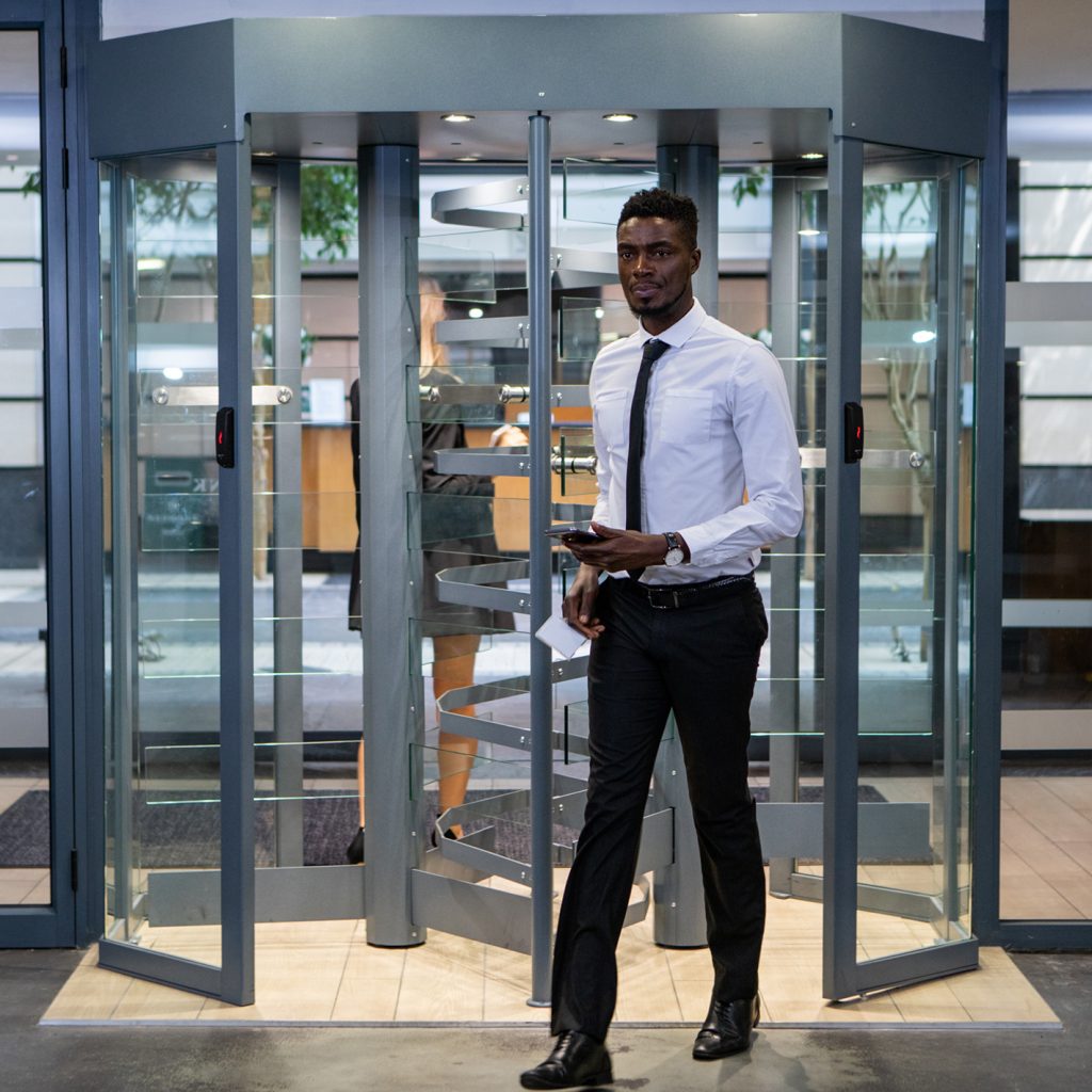 TRITON Full Height Turnstile with Octagonal Glass - TURNSTILES.us