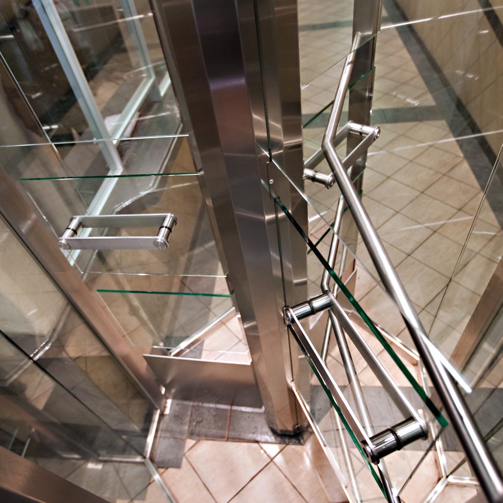 TRITON Full Height Turnstile with Octagonal Glass - TURNSTILES.us